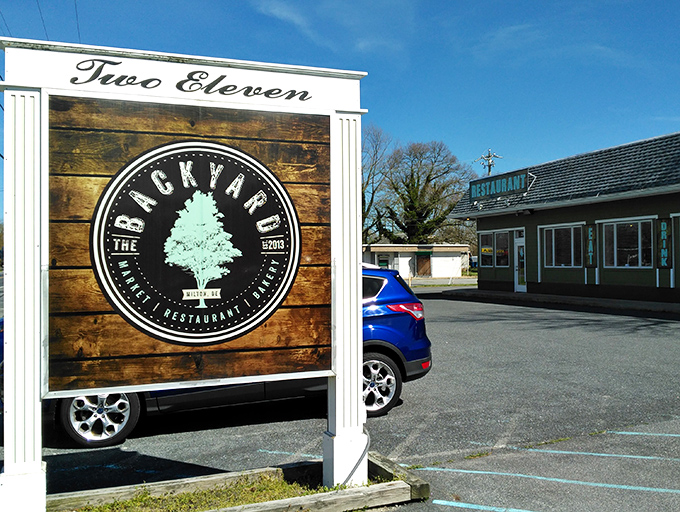 Two Eleven Backyard's sign promises exactly what you'll find – an eatery that feels like your friend's perfect cookout.
