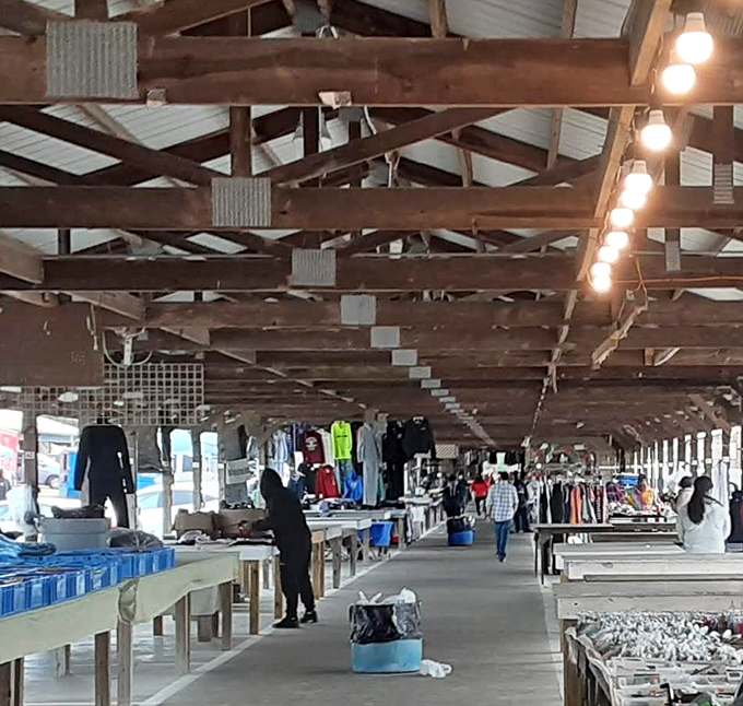 Inside The Barnyard, vendors display their wares under rustic wooden rafters. The perfect setting for discovering that one-of-a-kind find!