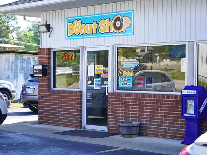 Clean white siding, blue trim, and an "OPEN" sign that triggers Pavlovian responses in locals. South Hill's morning happiness headquarters!