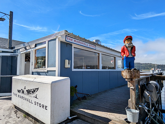 A seafood shack with a sailor statue standing guard. The oysters here taste like they jumped from the bay to your plate.