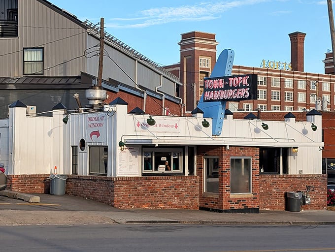 This little white building with the retro blue sign has been Kansas City's 24-hour burger sanctuary through good times and bad.