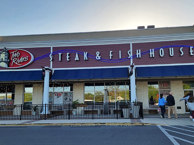 The neon sign promises "Steak & Fish House," but locals know Two Rivers delivers something even better: a taste of Maryland perfection.