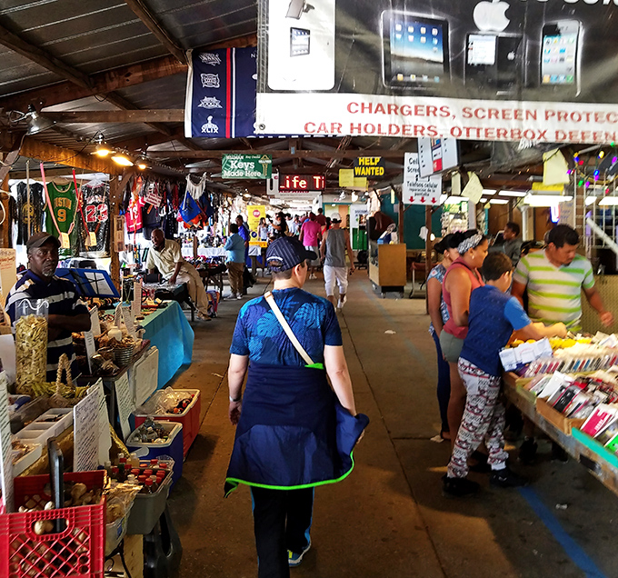 Shoppers browse with the focus of detectives solving a case. The mystery: finding the perfect deal in this treasure trove.