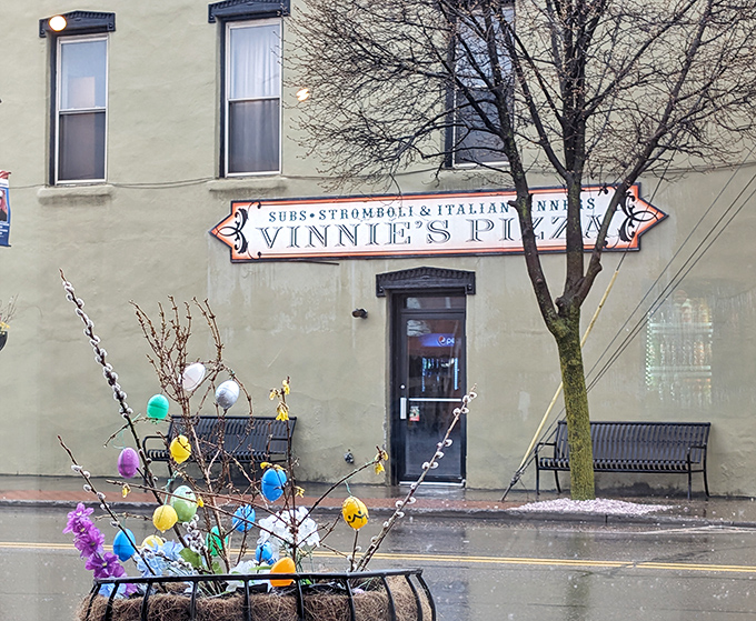 The classic storefront sign tells you everything you need to know &ndash; Vinnie's means business about pizza.