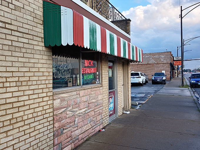 No frills, no fuss, just that perfect tavern-style thin crust that haunts your dreams in the best possible way.