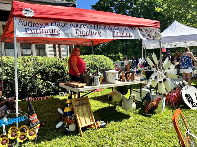 Under Audrey's red tent, vintage treasures and handcrafted items create an irresistible display that beckons to passersby.