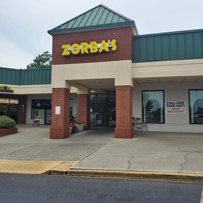 Where Mediterranean magic meets pizza perfection. That green roof houses ovens that understand the language of good food.