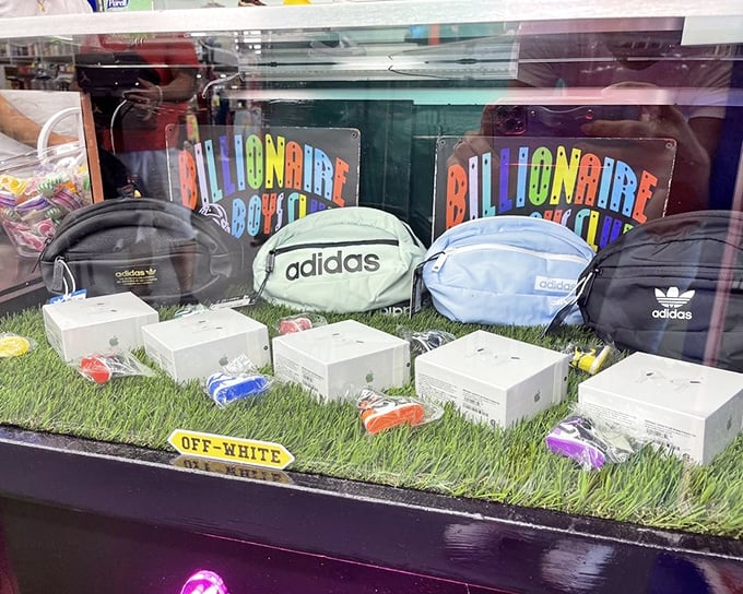 Designer dreams at bargain prices. These Adidas fanny packs and Apple boxes might raise eyebrows about authenticity, but they'll certainly start conversations.