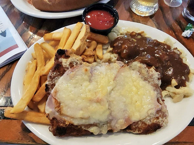 Alpine schnitzel that's been pounded thin, breaded to perfection, and topped with melty cheese&mdash;comfort food that transcends language barriers.