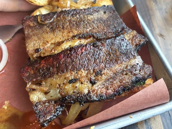 The brisket sandwich isn't messing around. That bark, that tenderness, that perfect ratio of meat to bread&mdash;it's architecture you can eat.