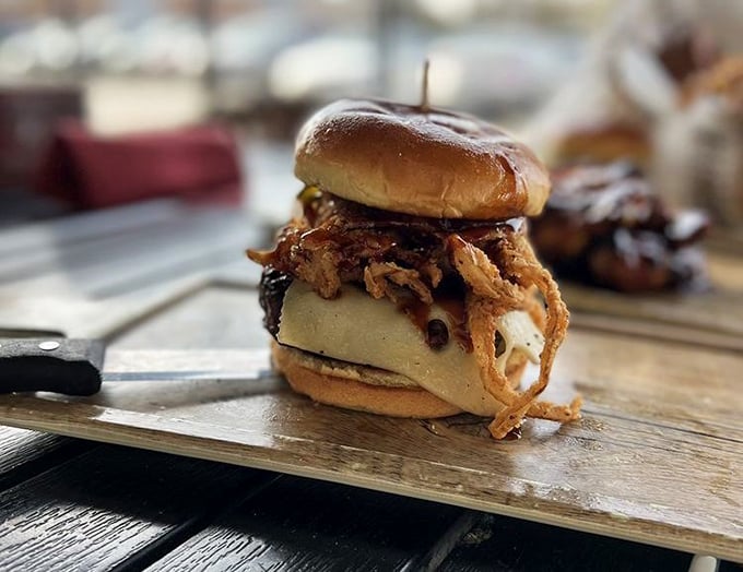 This isn't just a burger with crispy onions&mdash;it's architecture. A delicious, precarious tower that dares you to figure out how to eat it.