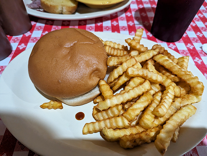 The sandwich-fries ratio that barbecue mathematicians have been trying to perfect for generations. Golden crinkle cuts playing the perfect supporting role.
