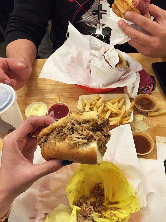 This pulled pork sandwich isn't just falling apart—it's having a delicious identity crisis between Southern BBQ tradition and California innovation.