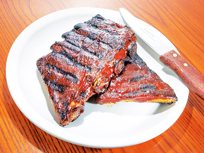 These BBQ ribs aren't just falling off the bone&mdash;they're practically jumping onto your fork, wearing their caramelized glaze like a badge of honor.