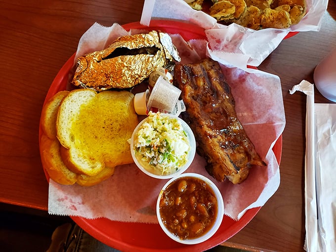 Baby back ribs, coleslaw, and those legendary beans&mdash;the holy trinity of barbecue that makes grown adults weak in the knees.
