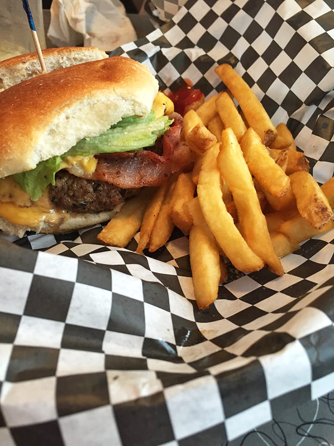 This bacon burger doesn't mess around - it's built like a delicious skyscraper with all the right architectural elements.