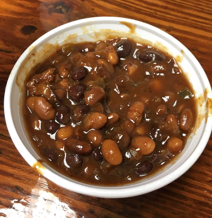These baked beans have clearly been introduced to bits of smoked meat and decided to start a beautiful relationship. The sauce? Just the matchmaker.