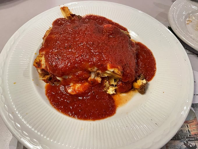 Lasagna that doesn't know the meaning of restraint—layers of cheese, meat, and sauce in perfect harmony like a Pavarotti high note.