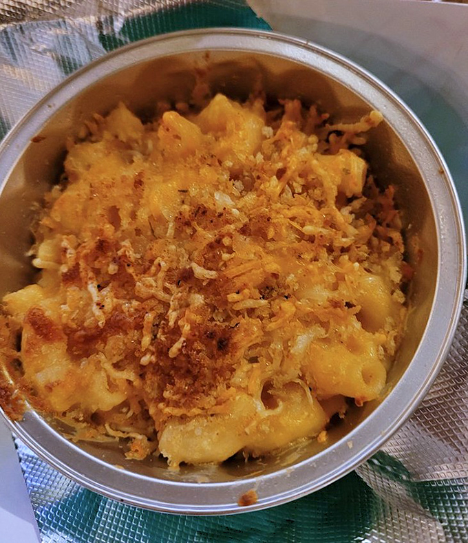 Mac and cheese elevated to art form - comfort food that hugs your soul from the inside out.