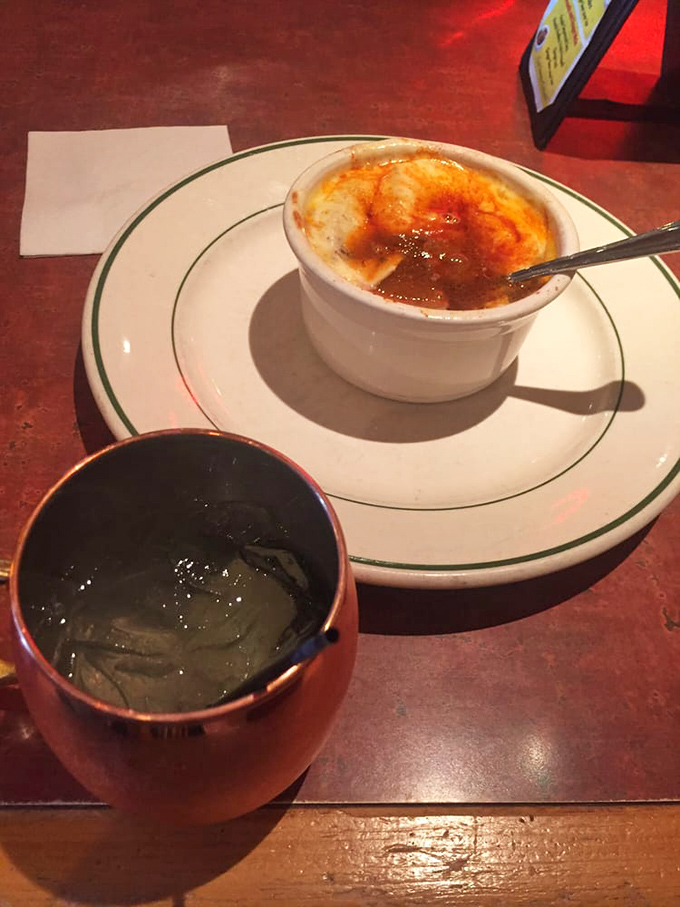 The cr&egrave;me br&ucirc;l&eacute;e's caramelized top waits to be cracked like a frozen lake in spring&mdash;revealing silky custard treasures below.