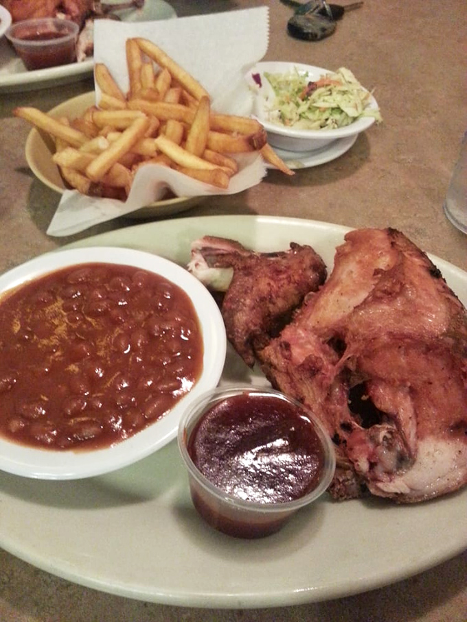 Baked beans that have clearly been simmering since breakfast, studded with bits of meat that tell you someone's grandma is involved.