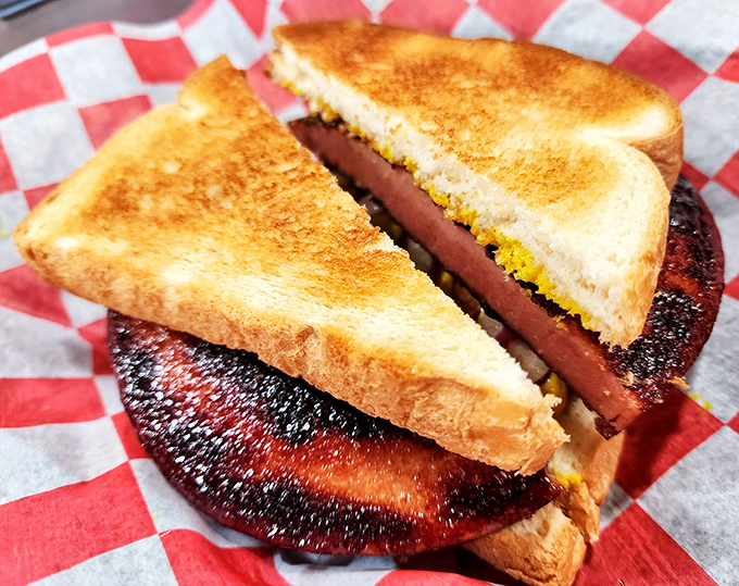 This isn't your sad lunch box bologna sandwich. Between perfectly toasted bread lies a thick-cut slice of nostalgia that's been upgraded to first class.