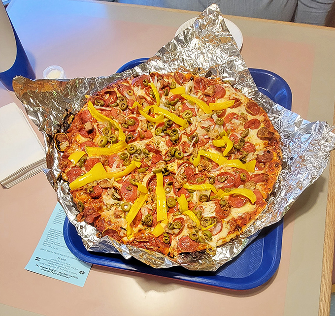 Those bright yellow banana pepper strips aren't just garnish&mdash;they're zingy flavor bombs cutting through the richness like comedians at a family reunion.