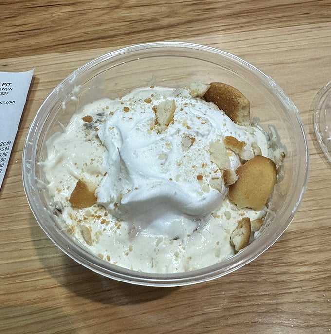 Banana pudding that tastes like childhood summers, complete with vanilla wafers swimming in creamy bliss.