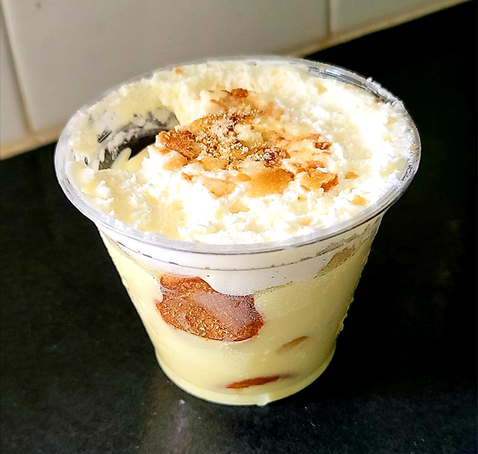 Banana pudding that makes you want to write home about it. Those vanilla wafers have surrendered to their creamy fate.
