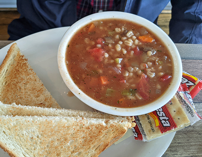 A bowl of homemade barley soup that would make your grandmother nod in approval. Paired with toast and crackers &ndash; because double-carbing is always the right decision.