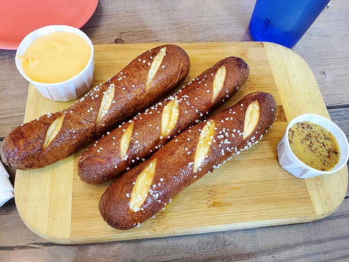 Bavarian pretzels that would make Munich proud, flanked by dipping sauces that turn bread into an event worth celebrating.