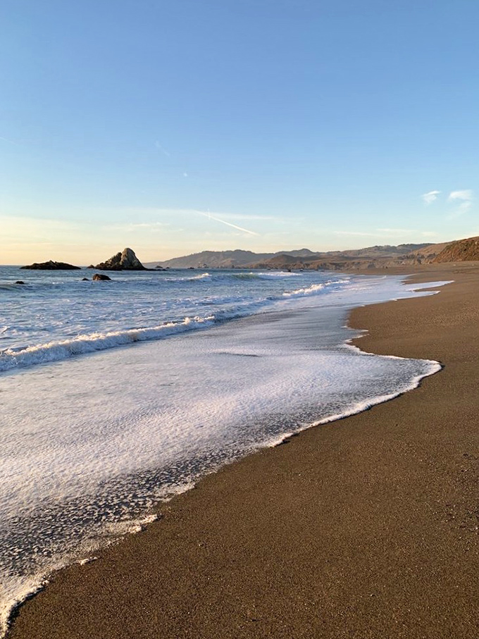 The meeting place of land and sea creates nature's perfect edge. Here, waves write poetry on sand while cliffs stand as silent, appreciative critics.