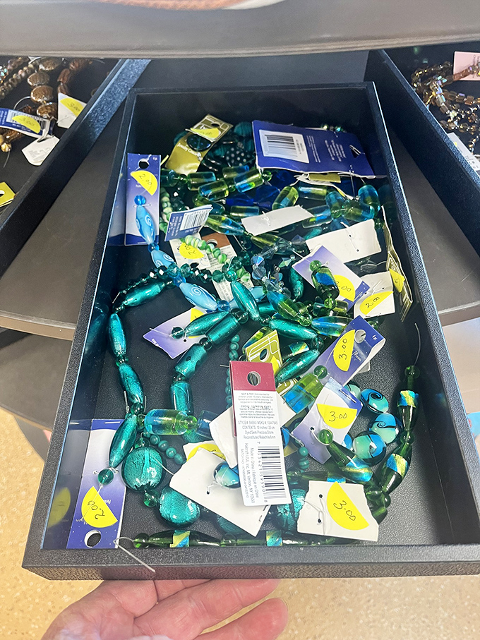 Craft enthusiasts, rejoice! This bead display offers enough sparkly possibilities to fuel a thousand creative projects.