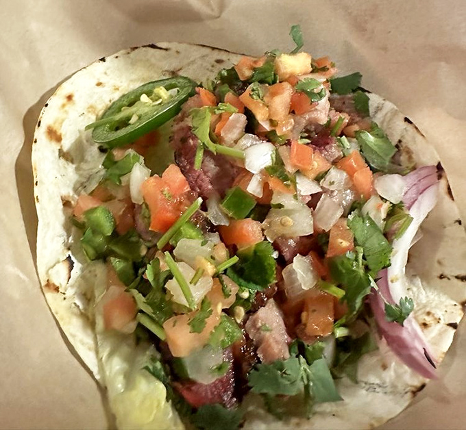 Tacos: where BBQ meets Mexican inspiration in a hand-held flavor explosion that makes you wonder why this culinary marriage didn't happen sooner.