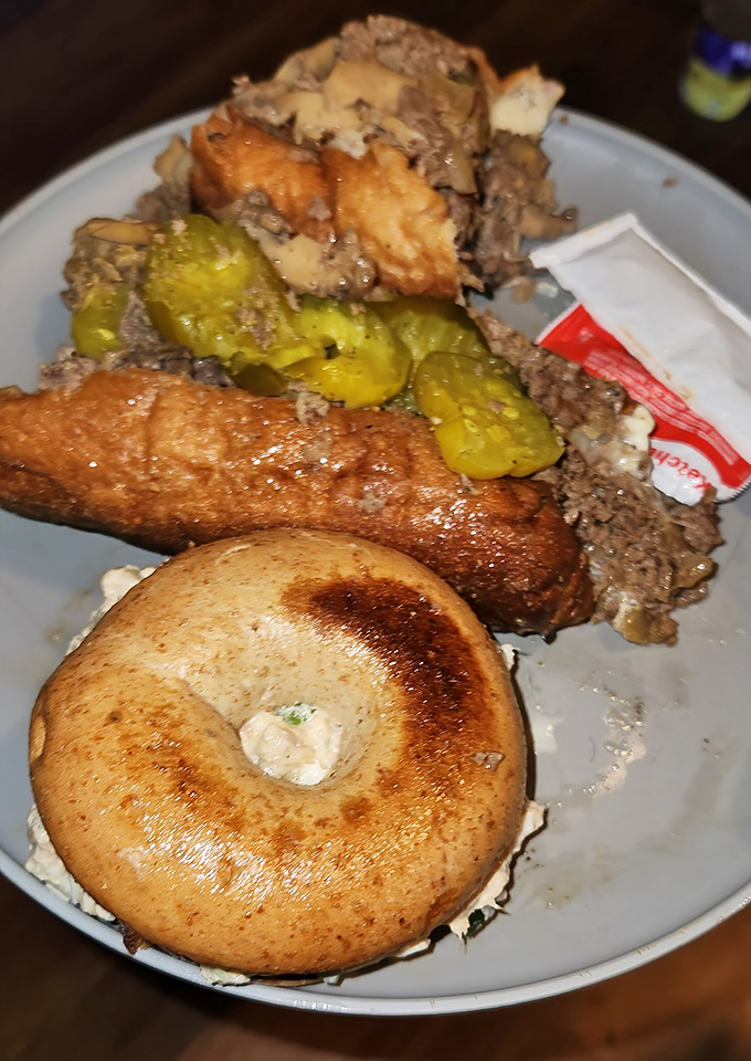 Behold the holy trinity of Philly cuisine: meat, cheese, and pickles on a plate. No Instagram filter required for this kind of beauty.