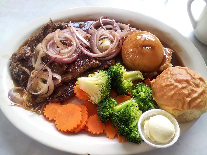 Not just any liver and onions&mdash;this is the dish that converts skeptics. Tender meat, caramelized onions, and those perfectly steamed vegetables make grandma's version seem amateur.