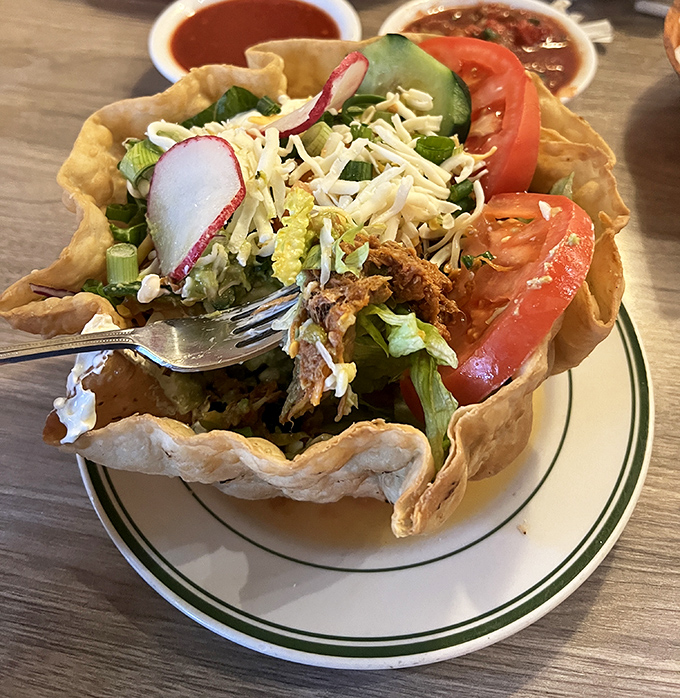 This taco salad transforms a simple concept into edible art, proving that presentation and taste can dance together beautifully.