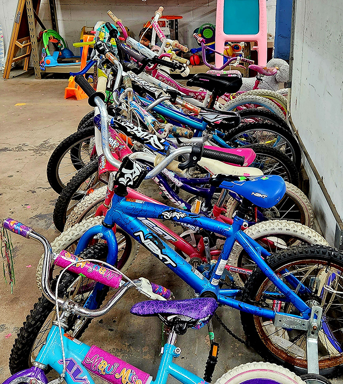 Bicycle battalion standing ready for new adventures. That turquoise beauty might have carried someone to their first date decades ago.