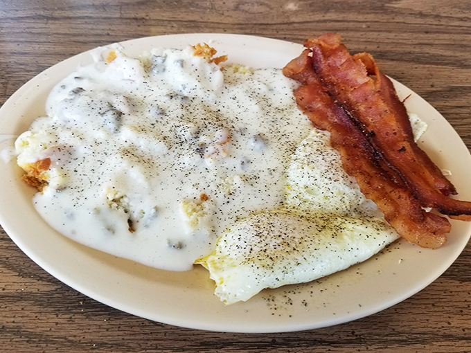 Biscuits and gravy that would make your grandmother both proud and jealous. That pepper-speckled gravy is practically a Southern baptism.