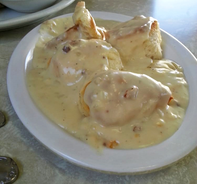 These biscuits and gravy aren't just a meal&mdash;they're an edible hug. The pepper-speckled cream sauce blankets everything in velvety comfort.