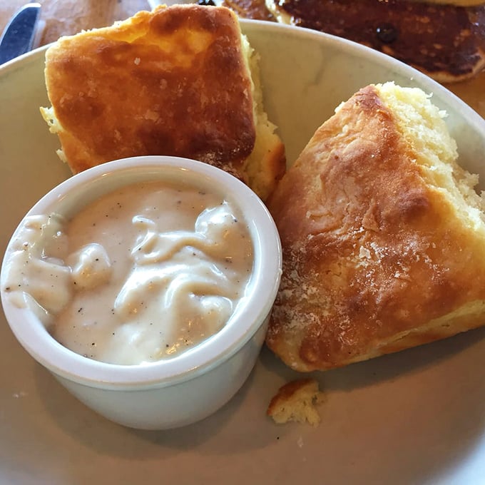 Fluffy biscuits swimming in peppery sausage gravy - comfort food that hugs you from the inside out.