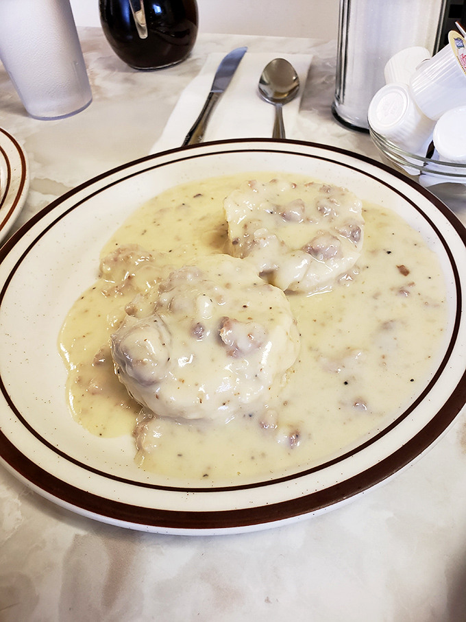 The legendary biscuits and gravy&mdash;two golden islands floating in a sea of sausage-studded gravy that's worth every single calorie.