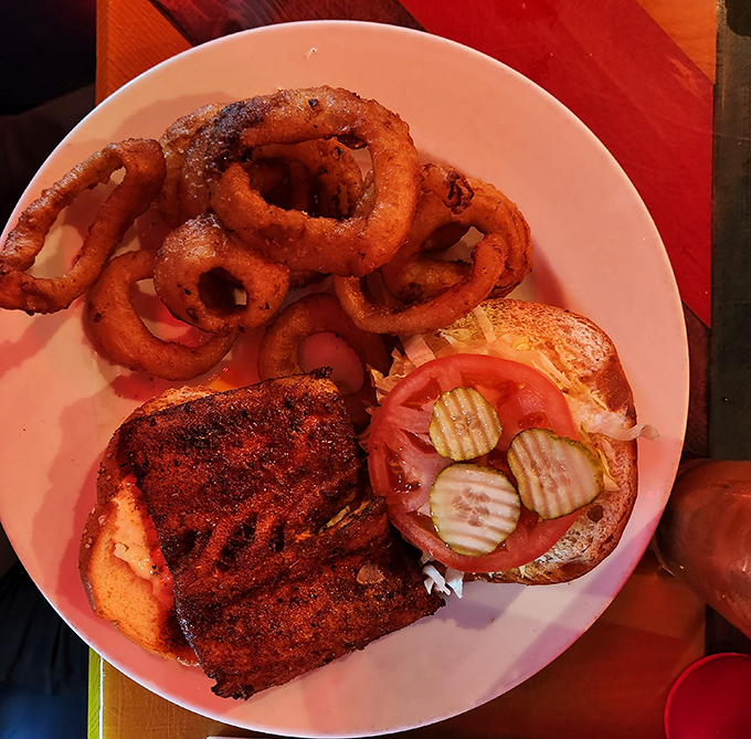 Blackened fish that's actually blackened, not just sprinkled with spices as an afterthought. Paired with pickles and onions, it's Florida's answer to the perfect sandwich.