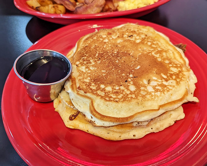 Pancakes so fluffy they practically hover above the plate. The perfect canvas for that puddle of maple syrup.
