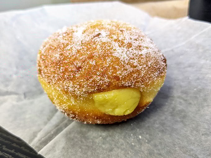 This sugar-dusted bombolone isn't just filled with custard&mdash;it's filled with hopes, dreams, and reasons to loosen your belt another notch.