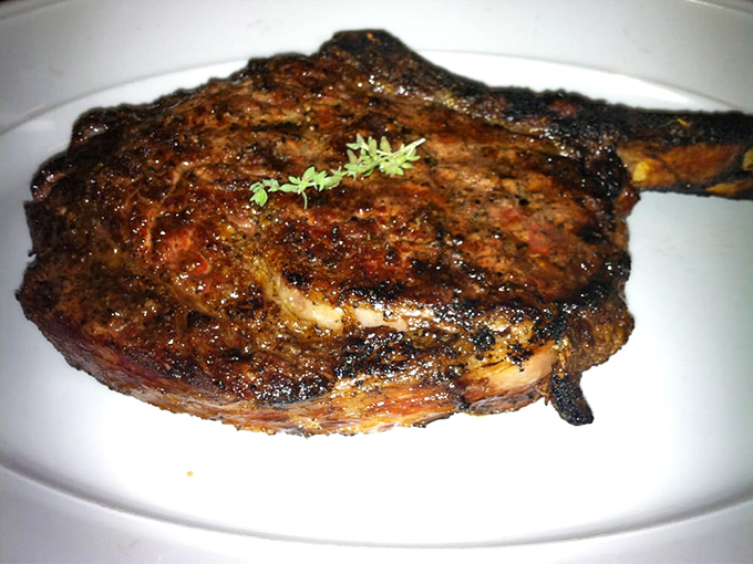A bone-in ribeye so magnificent it deserves its own spotlight and standing ovation from your taste buds.