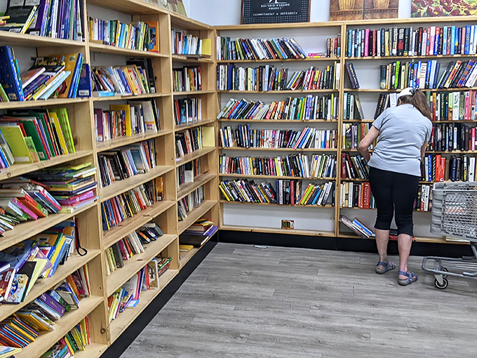 Bibliophiles, prepare to lose track of time! These wooden shelves hold everything from forgotten bestsellers to cookbooks that could change your dinner game forever.