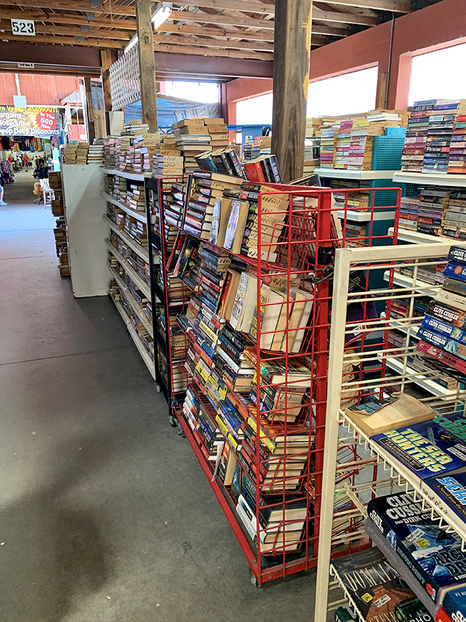 Literary treasures stacked to the rafters. The kind of place where you come for one cookbook and leave with seventeen paperback mysteries.