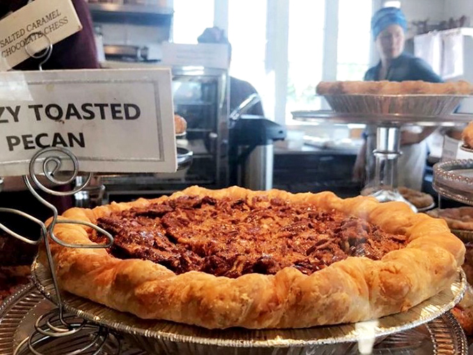 The boozy toasted pecan pie looks like what would happen if Southern comfort food went to finishing school and came back with a PhD in deliciousness.