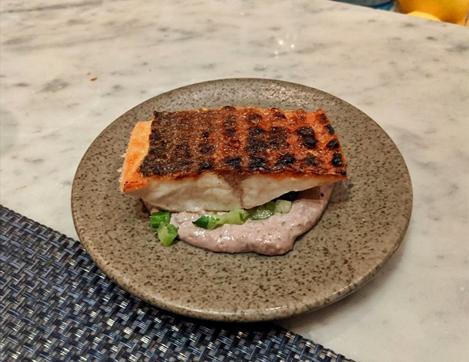 Perfectly crisp skin, tender flesh beneath&mdash;this branzino doesn't need to shout about its perfection. It simply delivers.